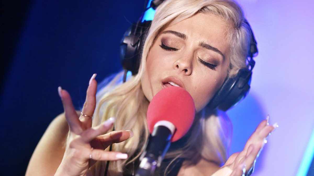 Bebe Rexha Rushed Off Stage After Phone Hits Her On The Face